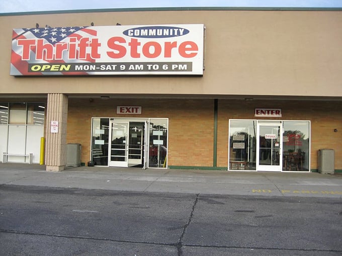 The storefront sign promises treasures within &ndash; open Monday through Saturday for your secondhand shopping adventures.