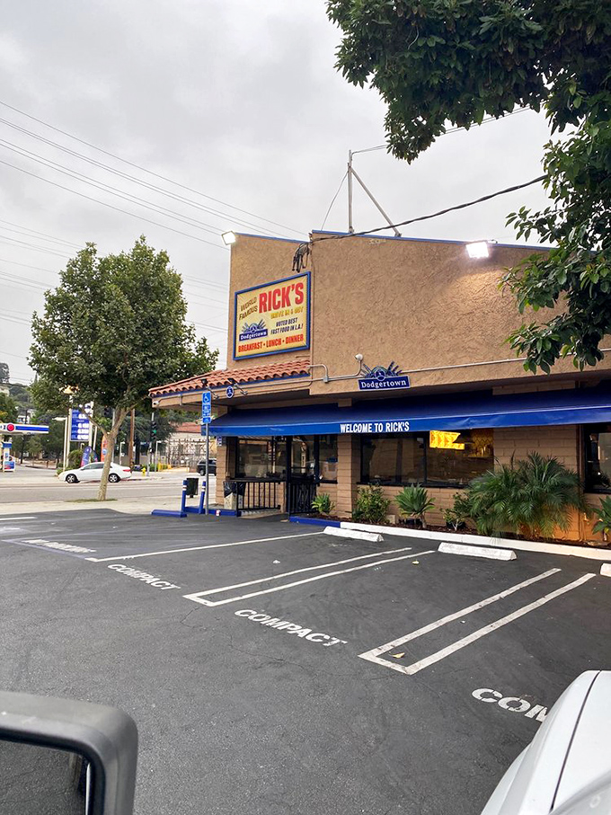 Morning light hits the "World Famous" sign as empty parking spaces promise to fill quickly with hungry patrons seeking breakfast nirvana.