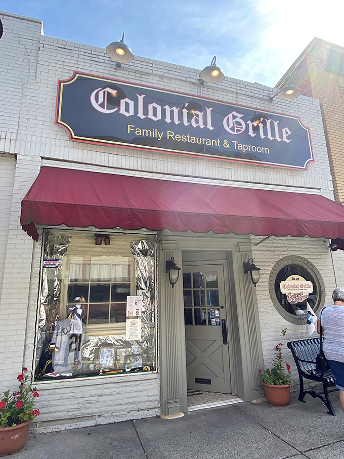 The welcoming entrance promises breakfast nirvana &ndash; those red geraniums aren't just decoration, they're a celebration committee for your impending food happiness.