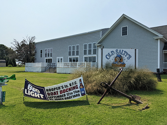The Old Salty's sign and nautical anchor announce your arrival at seafood paradise. The journey ends here; the feast begins now.