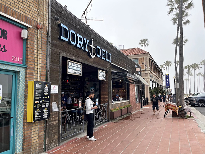The storefront that launched a thousand cravings, with palm trees standing guard like sentinels of good taste.