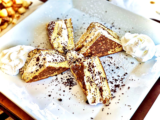 French toast transformed into edible art&mdash;dusted with powdered sugar and chocolate, it's breakfast masquerading as dessert.