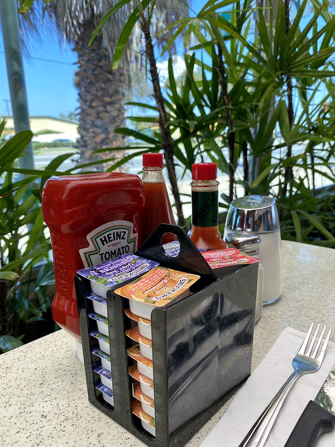 The universal diner table setup&mdash;ketchup, hot sauce, jam packets, and salt. These humble ingredients are the supporting cast to breakfast's main characters.
