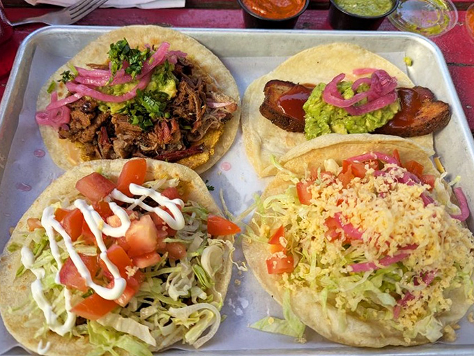 Barbecue goes global with these loaded tacos. Smoked meats find new expression with fresh toppings and pickled onions that cut through the richness like a magenta lightning bolt.