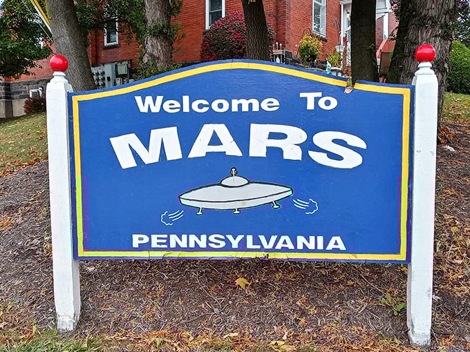 The "Welcome to Mars" sign leaves no doubt about the town's commitment to its planetary identity, complete with flying saucer illustration.