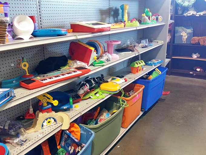 Toy section treasures span generations&mdash;from vintage Fisher Price to forgotten Happy Meal prizes, childhood nostalgia sold by the shelf.