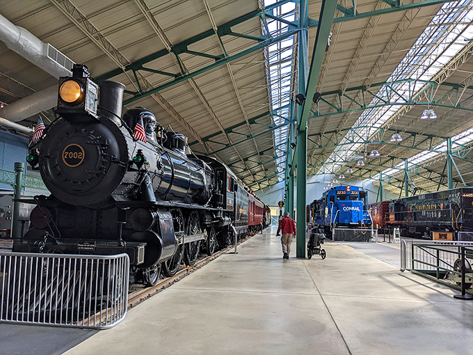 Multiple locomotives stand ready for duty, each one a mechanical marvel prepared to transport you through Pennsylvania's heartland.