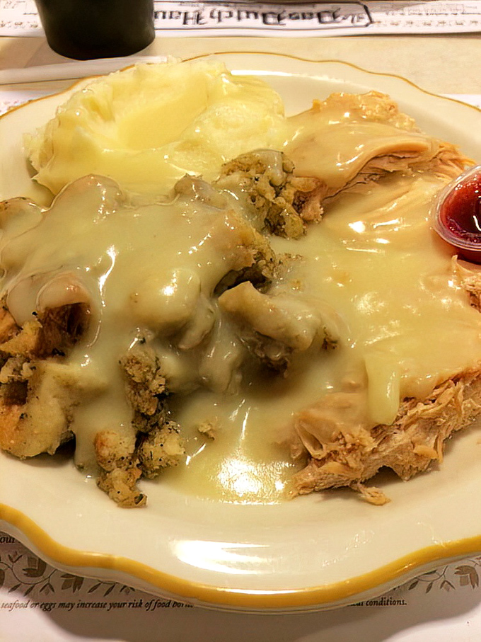 Turkey dinner that tastes like every holiday memory you've ever cherished. Gravy flowing like liquid gold over tender meat and fluffy potatoes.
