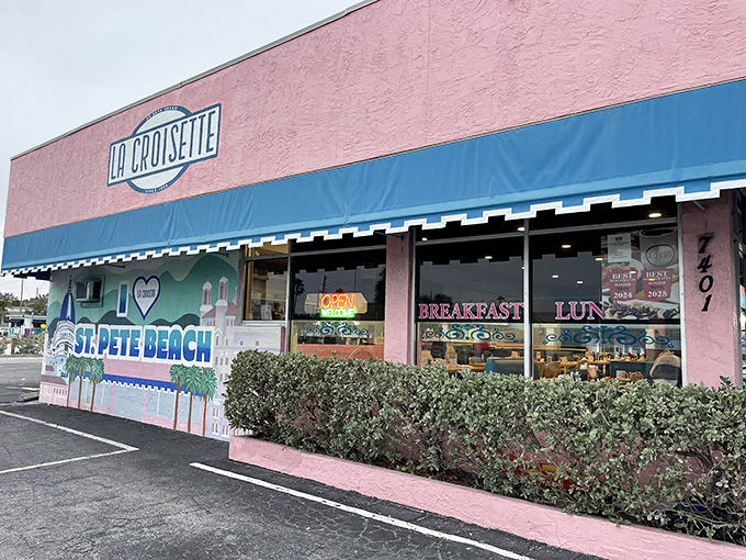 The side view showcases that unmistakable pink building with its "I &hearts; St. Pete Beach" mural&mdash;a local landmark that's earned its place in Florida's breakfast hall of fame.