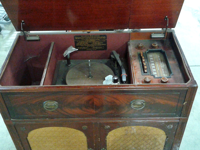 Vintage audio magic! This record player/radio combo isn't just furniture&mdash;it's a time machine to evenings when families gathered around for entertainment.