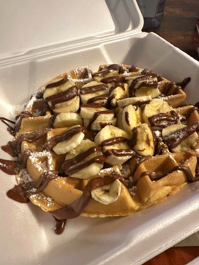This isn't just a waffle &ndash; it's a dessert masquerading as breakfast, complete with bananas and chocolate to maintain the delicious deception.