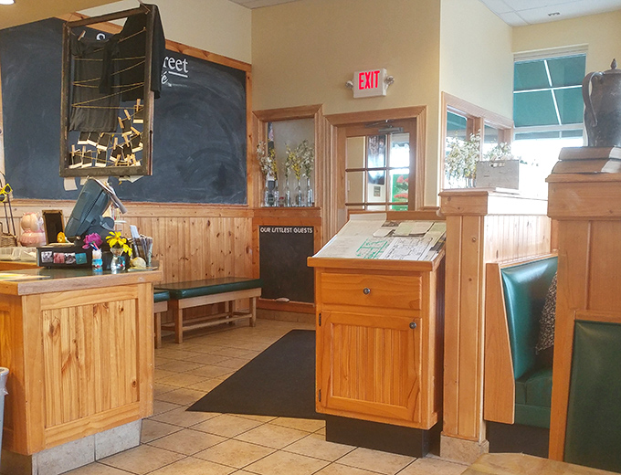 The welcoming entrance area where anticipation builds&mdash;like the lobby of a breakfast theater where pancakes are the headlining act.