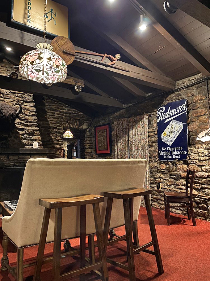 The waiting area's rustic charm makes even the pre-dinner moments feel special. Those stone walls have heard more anniversary toasts than a wedding photographer.