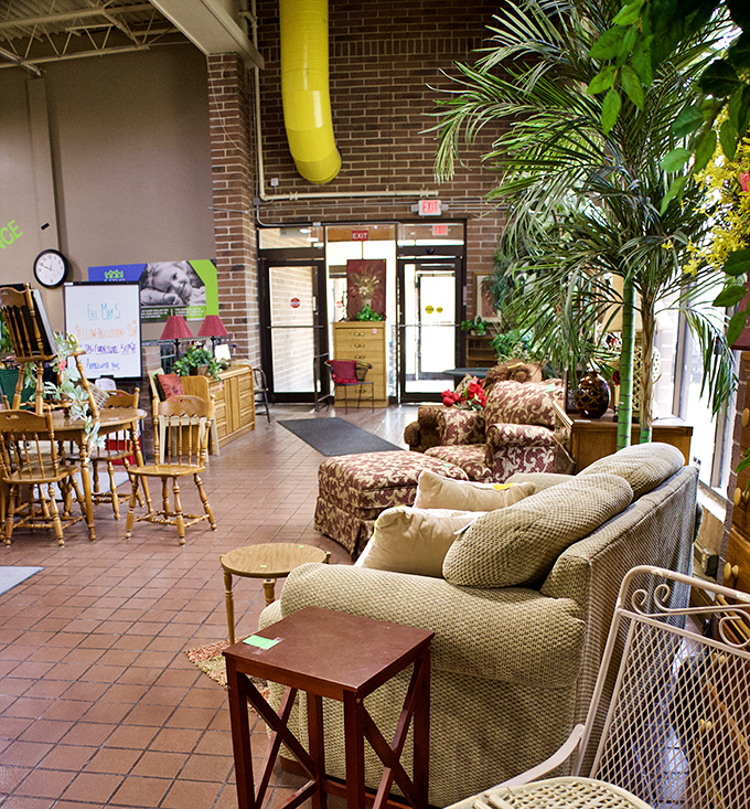The entryway lounge area, where exhausted spouses wait patiently while their partners utter those five dangerous words: "Just one more quick look."