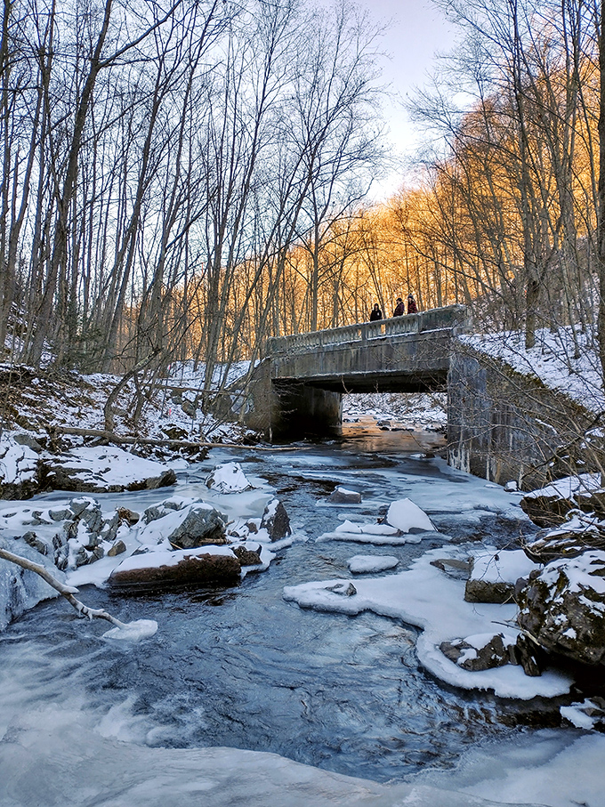 Winter transforms Seven Tubs into nature's ice sculpture garden, where flowing water and freezing temperatures create ephemeral art.
