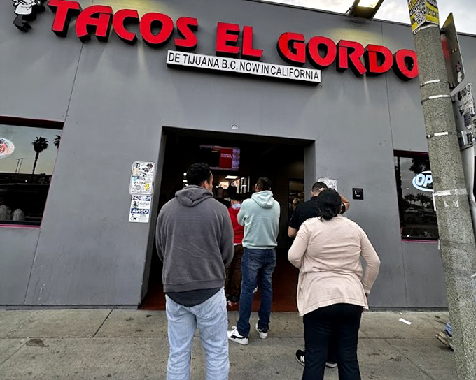 Tacos El Gordo's bold red signage proudly announces its Tijuana roots &ndash; a promise of authentic border-town flavors.