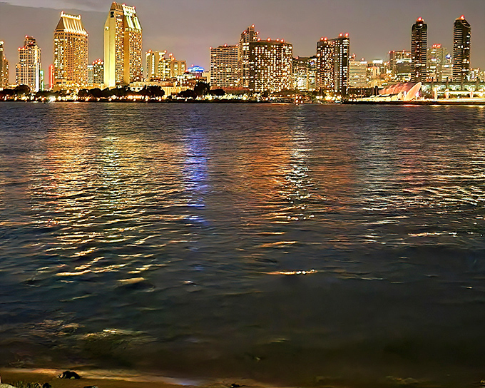 Bridge views and bay waters surround this resort community where luxury meets small-town coastal charm. 