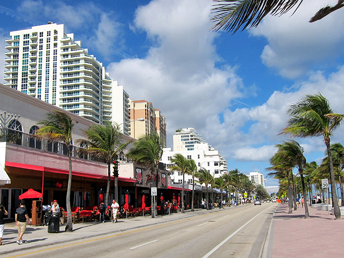 Palm trees sway along A1A in Fort Lauderdale, where beach vibes and city life create Florida's perfect coastal cocktail.