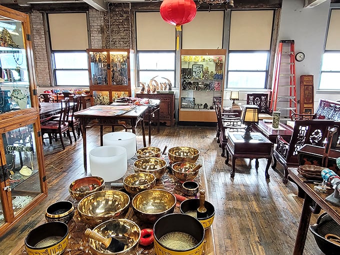 Treasure hunter's paradise! Golden singing bowls catch the light while antique furniture waits patiently to tell its stories.