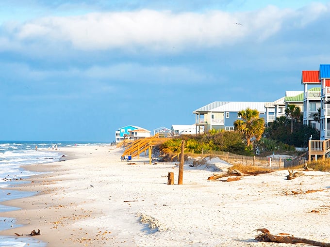 Colorful beach houses perched above pristine white sand in Apalachicola. Where Old Florida charm meets Gulf waters.