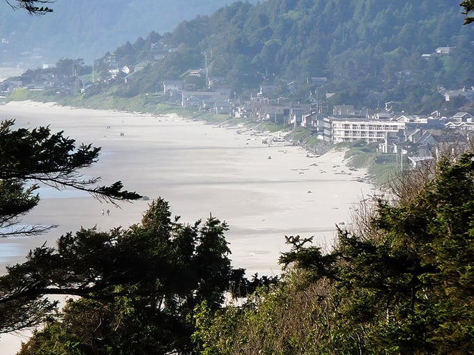 Cannon Beach: Miles of pristine sand stretch beneath forested hills, with charming beachfront homes that probably cost more than my retirement fund.