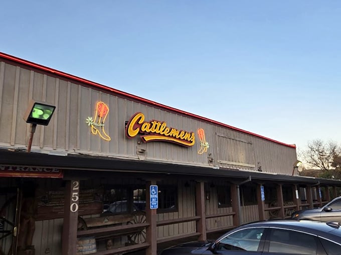 The iconic Cattlemen's sign glows with promise. This Dixon landmark has been beckoning hungry cowboys and city slickers alike for generations.