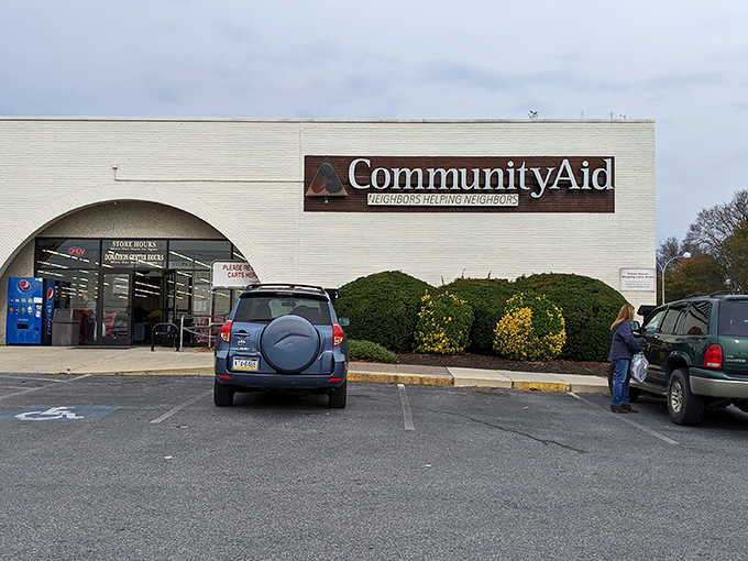 The welcoming facade of Community Aid, where treasure hunting begins and bargains await eager shoppers.