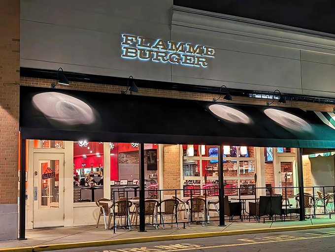 Flamme Burger's glowing sign beckons like a lighthouse for the hungry. Modern design meets old-fashioned flame-grilled goodness!