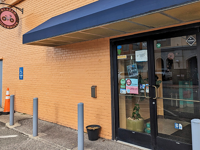 The unassuming brick exterior of Glazed Doughnuts hides a world of sweet treasures inside. Like finding a secret doorway to donut paradise!