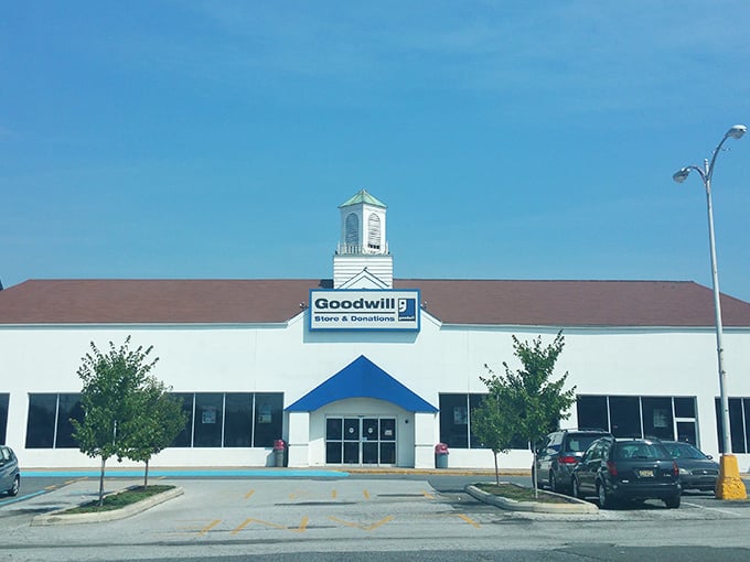 The iconic blue awning and charming cupola of Goodwill Wilmington &ndash; a thrifter's beacon visible from the highway!