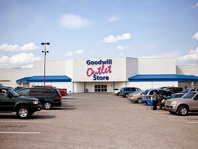 The Goodwill Outlet Store in Indianapolis stands like a treasure chest waiting to be opened. Blue awnings hint at the blue bins of possibilities inside.