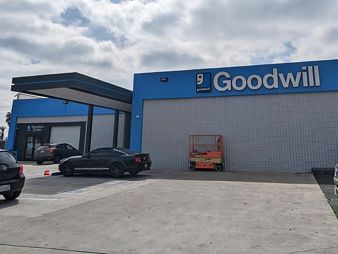 The blue fortress of bargains beckons! Goodwill's Sunset Boulevard location promises treasure hunting on an industrial scale.