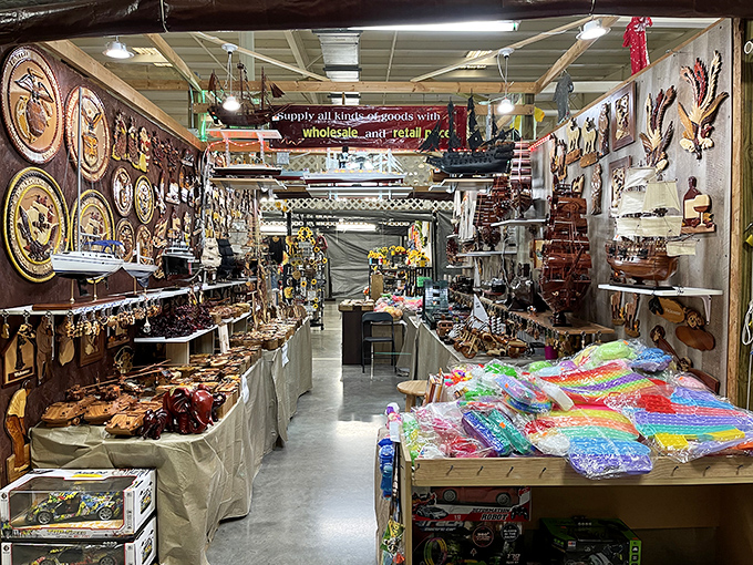 Treasure hunter's paradise! Handcrafted wooden items and colorful trinkets line this indoor aisle at Great Smokies Flea Market.