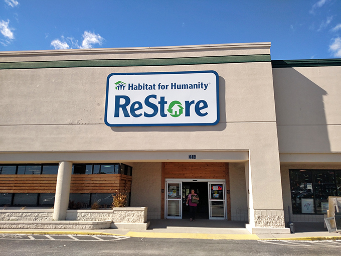 The Habitat ReStore's welcoming facade promises treasure hunting with a purpose. Every purchase here helps build homes for families in need.