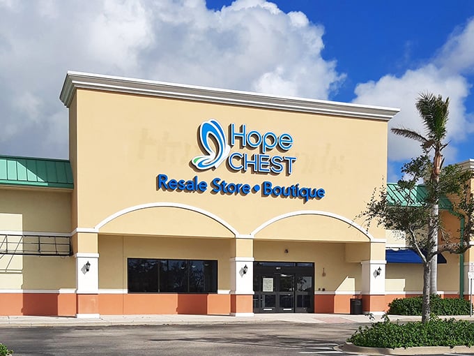 The welcoming facade of Hope Chest gleams in the Florida sunshine, promising treasures within those beige walls.