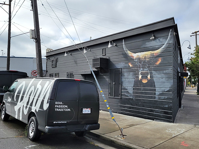 That longhorn mural isn't just decoration &ndash; it's a promise of Texas-style BBQ magic happening inside. 
