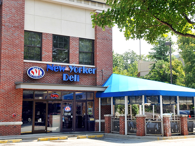 The iconic blue awning of Jack's New Yorker Deli promises authentic Manhattan flavors in the heart of Atlanta.