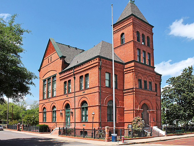 Jefferson's historic courthouse stands like a Victorian time capsule, its red brick walls whispering stories of Texas past.