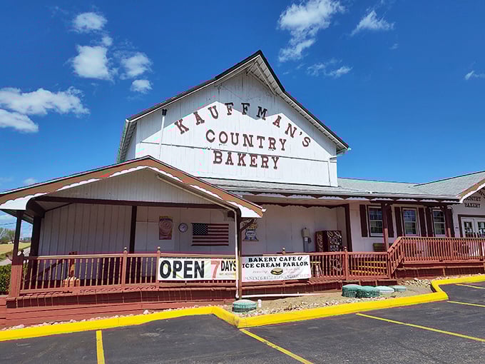 The classic red-trimmed porch at Kauffman's practically whispers, "Come in, the cinnamon rolls are still warm!"
