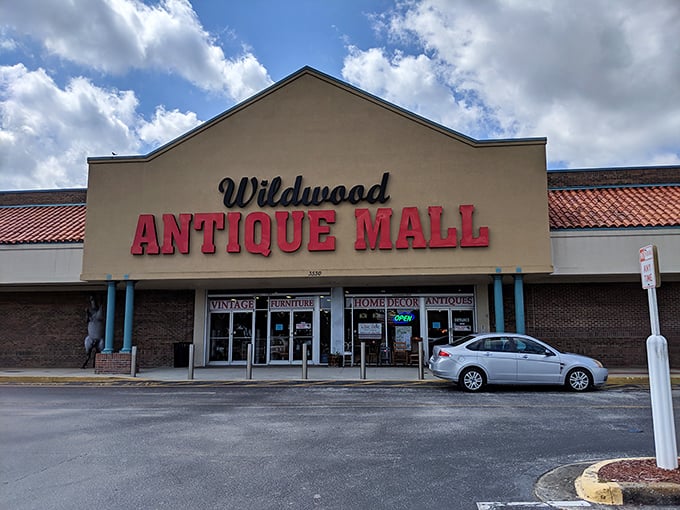 The Wildwood Antique Mall's bold red sign promises treasures inside &ndash; like a Vegas marquee for vintage hunters!