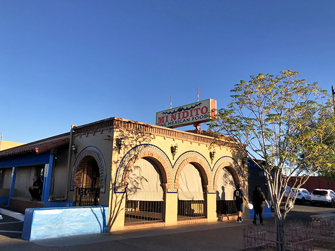 Mi Nidito's iconic arched entryway beckons like an old friend. Those stone columns have witnessed countless first dates and family celebrations.