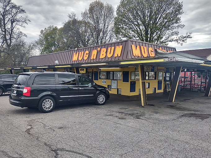 That yellow and orange beacon calls to hungry souls like a lighthouse for landlocked sailors seeking burger salvation.