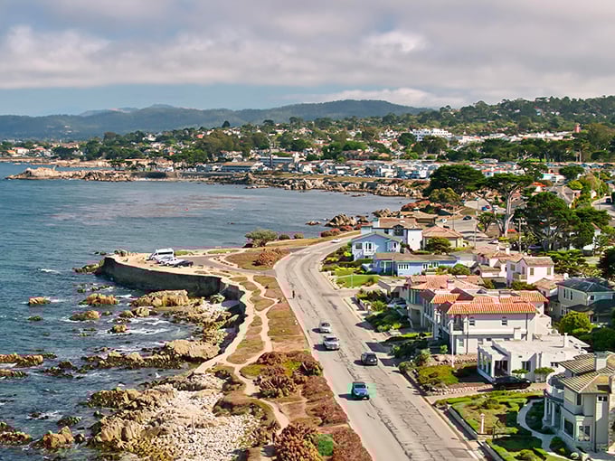 Pacific Grove's coastline unfolds like a perfectly painted postcard, where Victorian charm meets endless Pacific blue. 