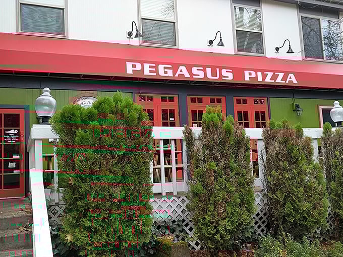 Pegasus Pizza's bold red awning isn't just eye-catching&mdash;it's like a beacon calling all hungry mortals to pizza paradise.