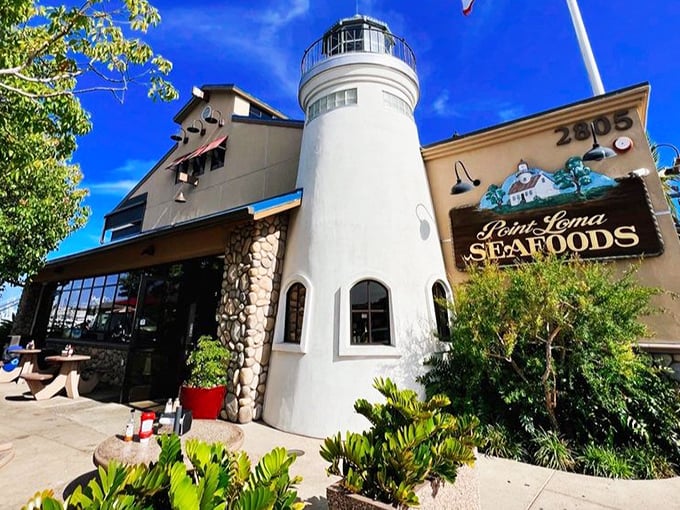 The lighthouse-shaped entrance of Point Loma Seafoods stands like a beacon for seafood lovers. Maritime charm meets culinary excellence in this San Diego landmark.