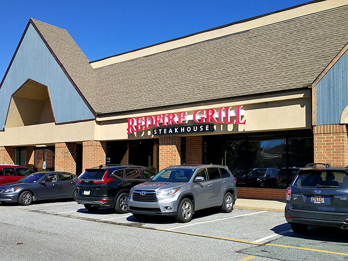 The brick-and-beam exterior of Redfire Grill promises what lies within &ndash; serious steak business with zero pretension.