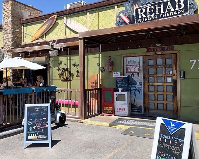 The vibrant green exterior of Rehab Burger Therapy promises a tropical escape. Who knew burger paradise was hiding in Scottsdale?
