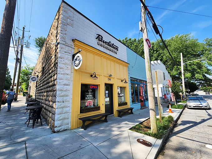 Revolution Doughnuts' yellow storefront is like a beacon of hope for the donut-deprived. That stone exterior hides sweet treasures within!