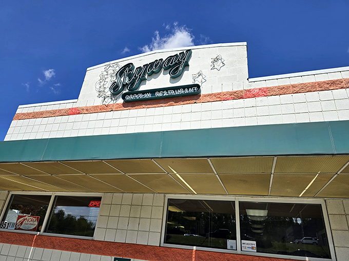 The Skyway Drive-In's classic mint-green and white facade is like a portal to the 1950s. Pure nostalgic bliss!