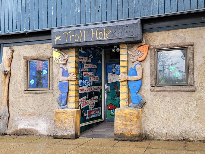 Troll guardians flank the entrance to this whimsical wonderland. Like finding Narnia in a closet, but with more wild hair!